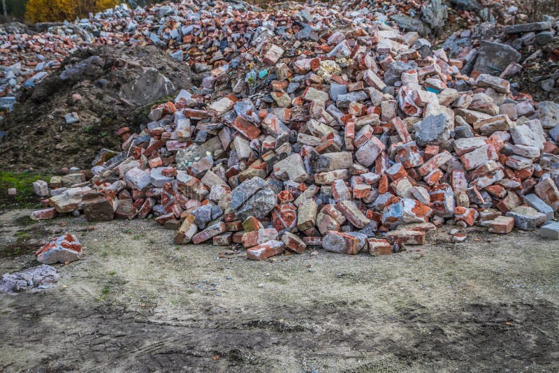 Pile of broken bricks stock photo. Image of dump, grunge - 173491124