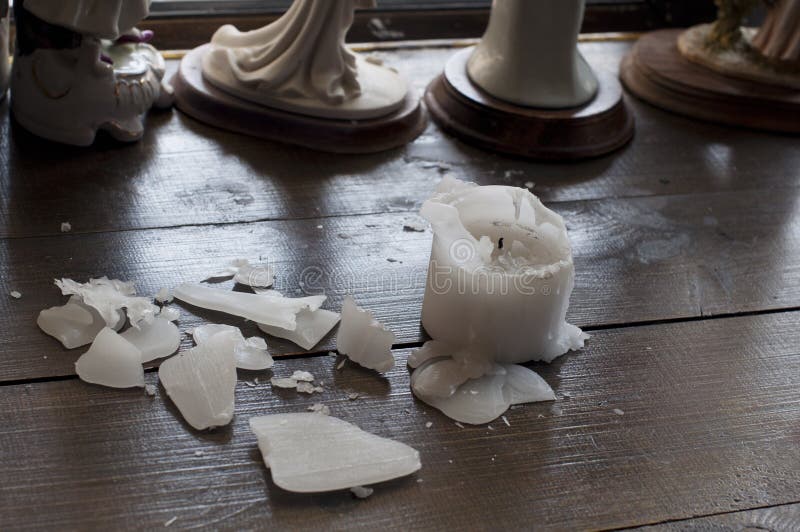 Broken and burning candle stock photo. Image of decorative - 257288208