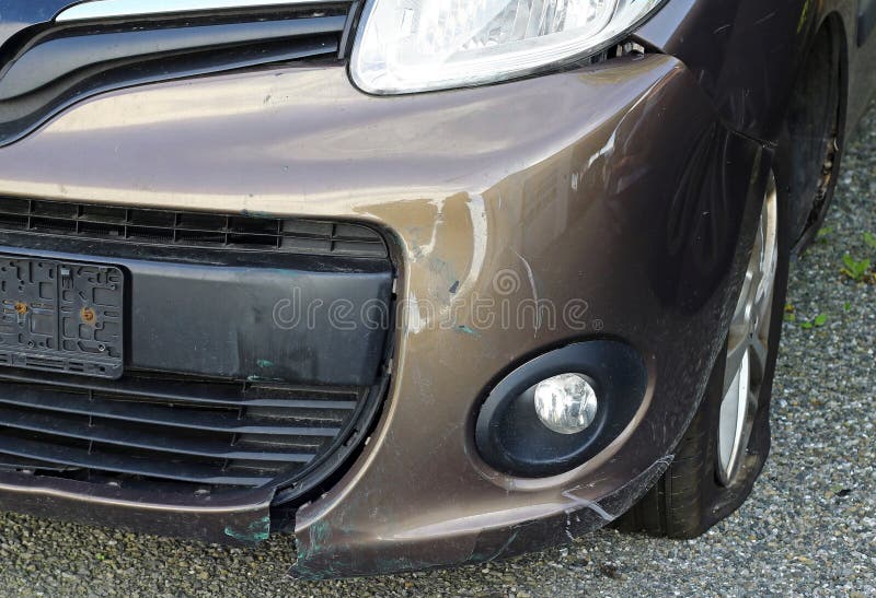 A Broken Car with Paint Damage and Broken Parts Stock Photo - Image of ...