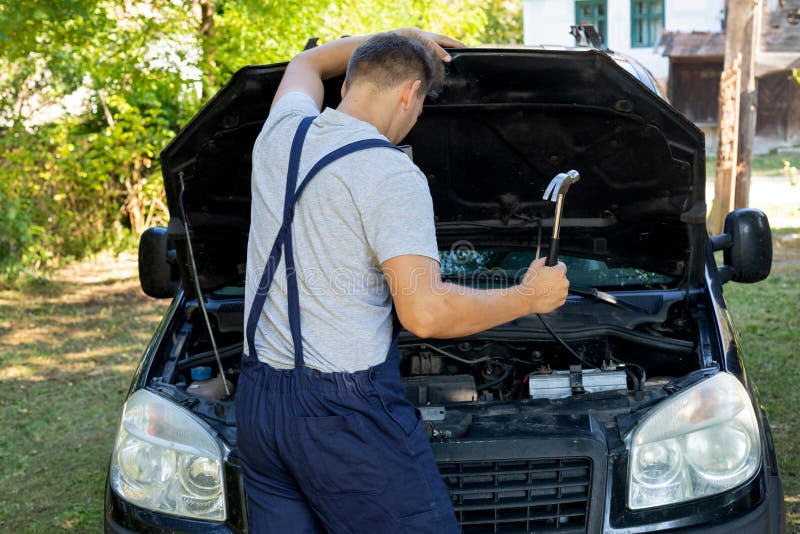 Broken car stock photo. Image of person, repair, check - 158031836