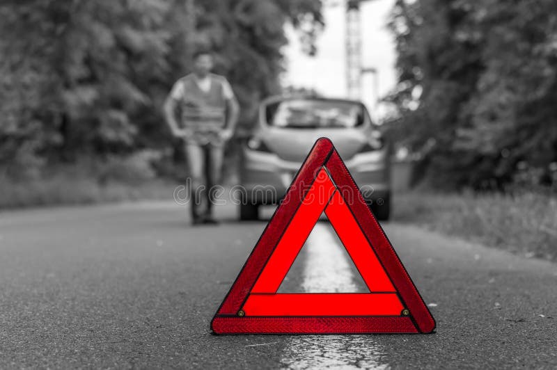 Broken Car on the Road and Unhappy Driver with Red Triangle Stock Image ...