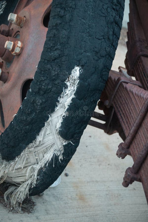 Broken Car Tire on a Rusty Wheel Stock Image - Image of abandoned ...