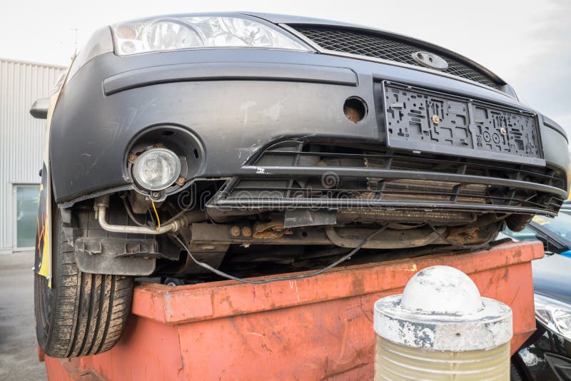 Broken car in trash editorial image. Image of deform - 103162200