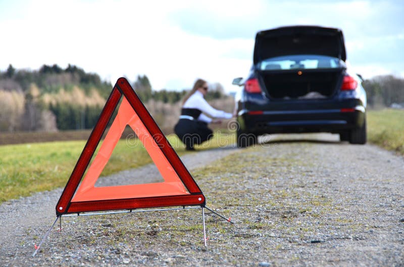 Broken car and triangle stock photo. Image of problems - 37675016
