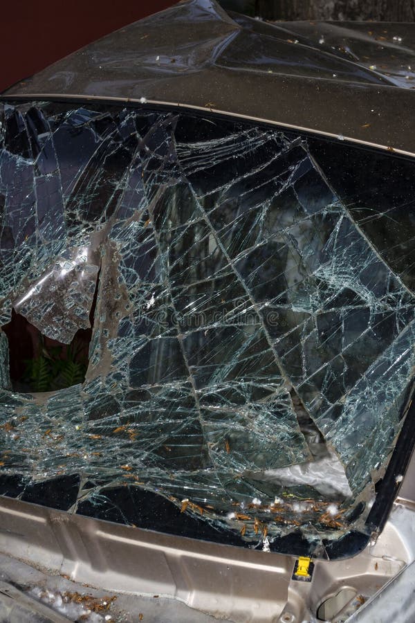 After the Car Crash, Windshield Fall on the Road Surface Stock Photo ...