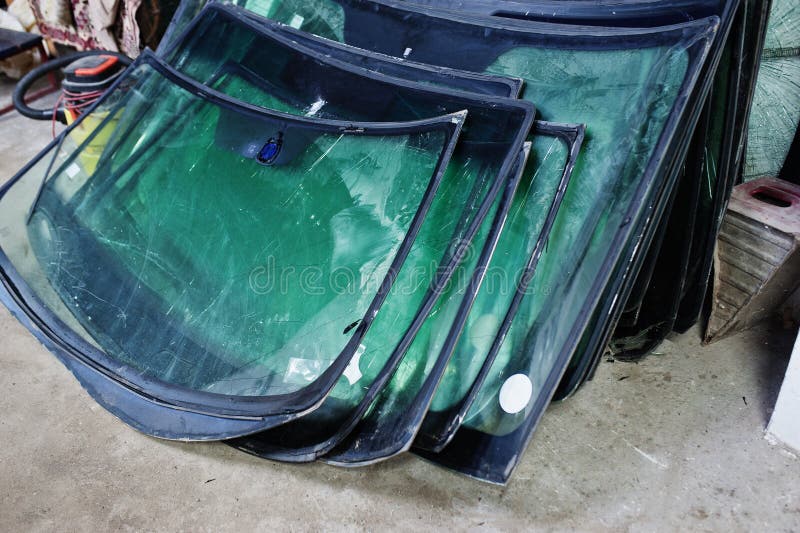 Broken Car Windshield, Replacing Windscreen of a Car in Auto Service ...