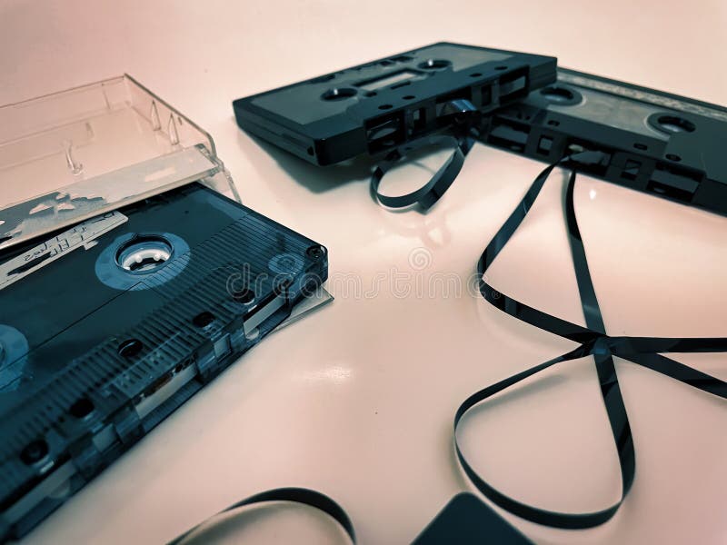 Broken Cassette Tape To Be Rewound Stock Photo - Image of disco, retro ...