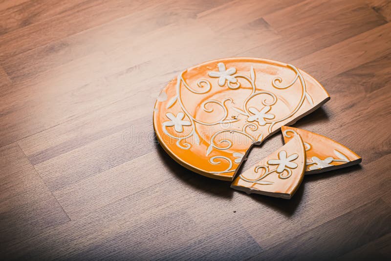 Broken Ceramic Plate on Wooden Floor Stock Photo - Image of ceramic ...