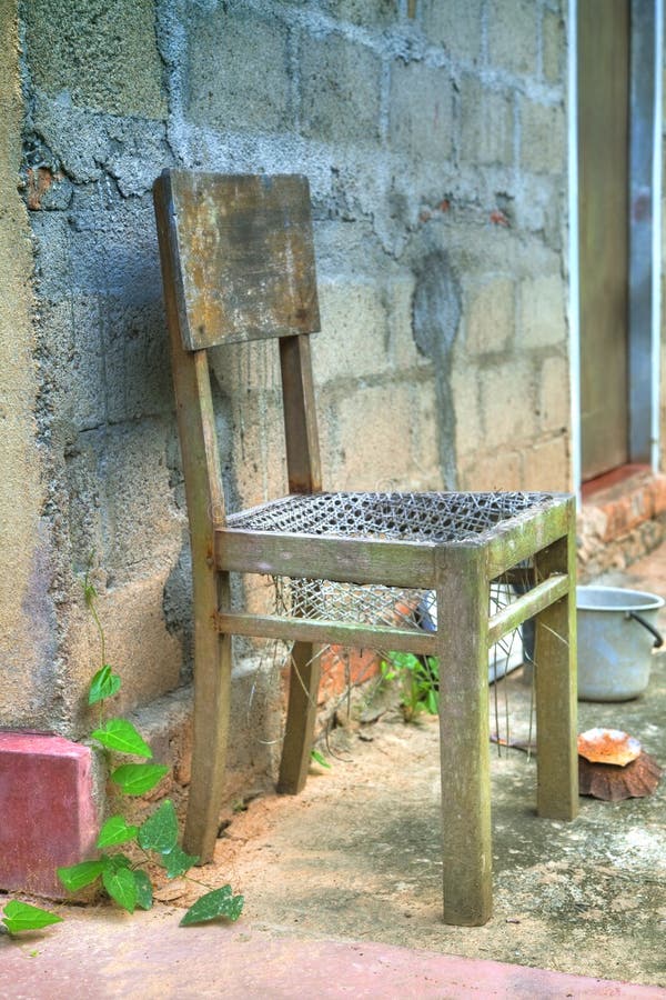 A Broken Chair is Standing in Front of a House Stock Image - Image of ...