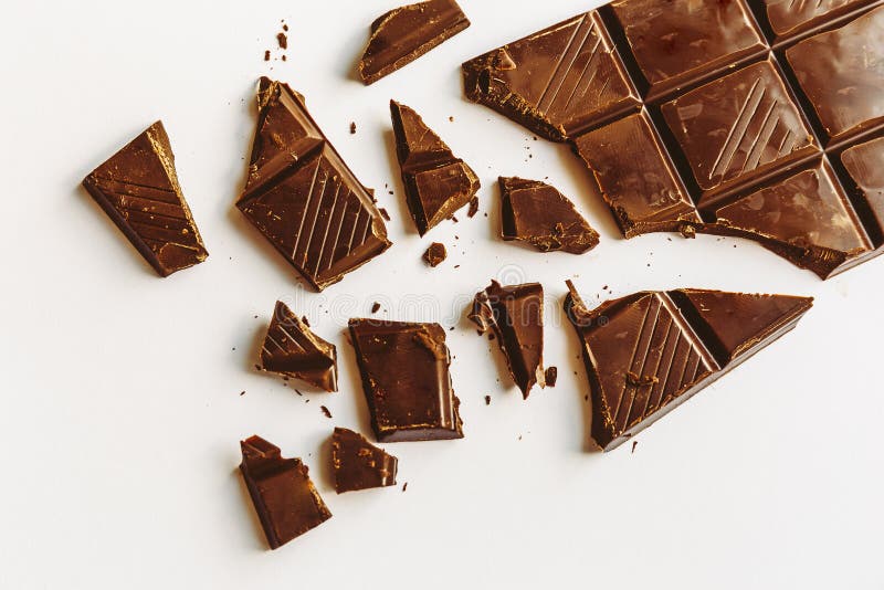 Broken Bar of White Chocolate, Cinnamon and Cup of Coffee an Black ...