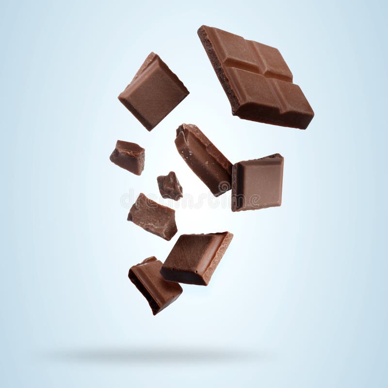Broken Chocolate Bar Pieces Falling on Light Blue Background. Banner ...