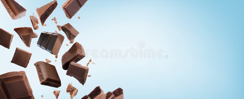 Broken Chocolate Bar Pieces Falling on Light Blue Background. Banner ...