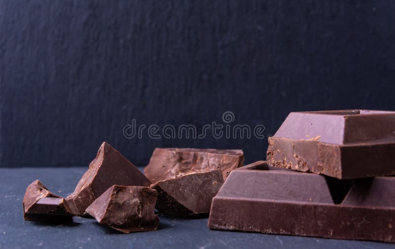 Broken chocolate bar stock image. Image of slice, cocoa - 152051455