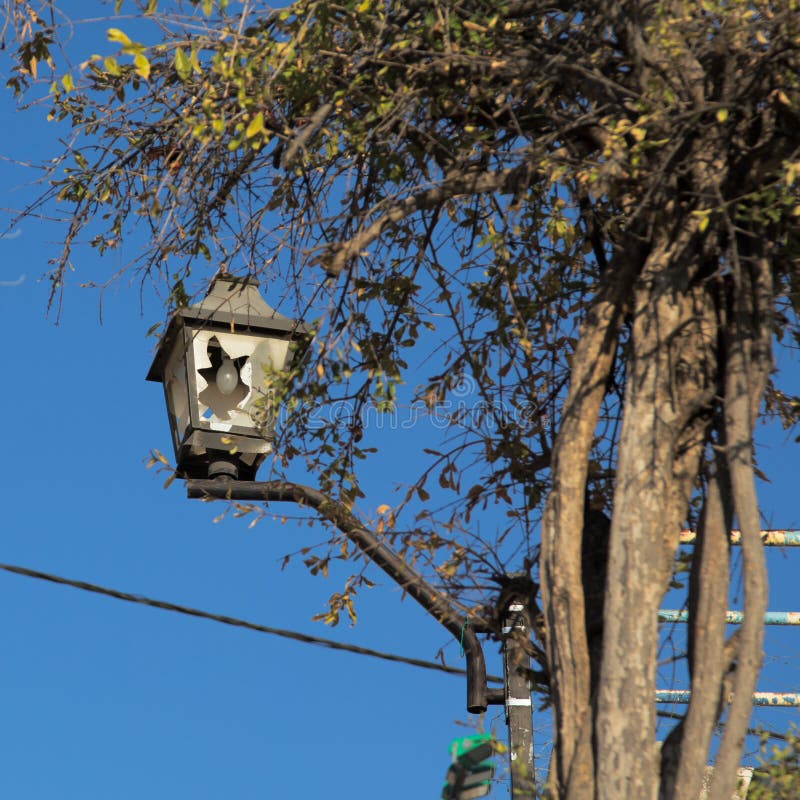 Broken City Light on the Blue Sky Background. Stock Image - Image of ...
