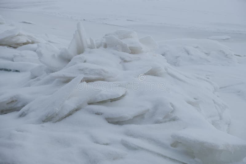 Broken Cracked Ice Over the Water Surface of the Sea Stock Photo ...