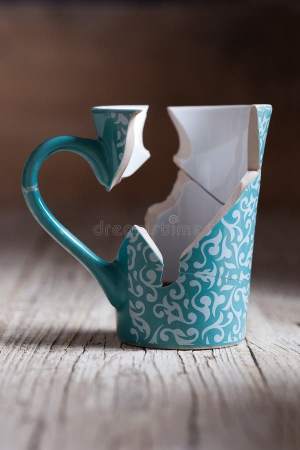 Broken Cup and Stuck Back on Wooden Table Stock Photo - Image of blight ...