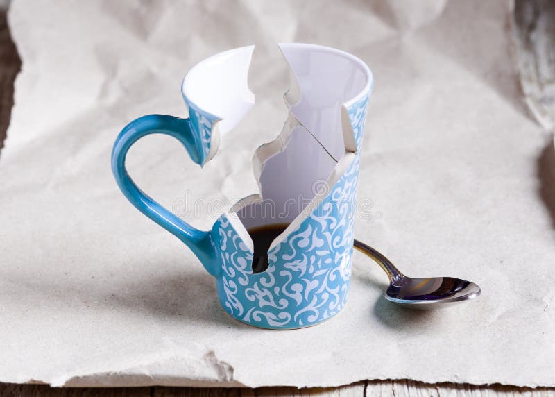 Broken Cup and Stuck Back on Wooden Table Stock Image - Image of paper ...