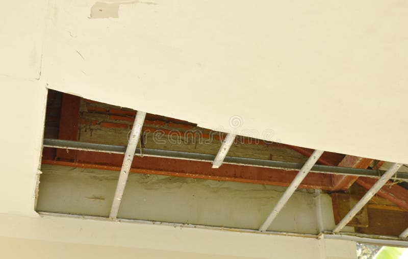 Broken and Damage Home Ceiling Falling Down To Ground Stock Image ...