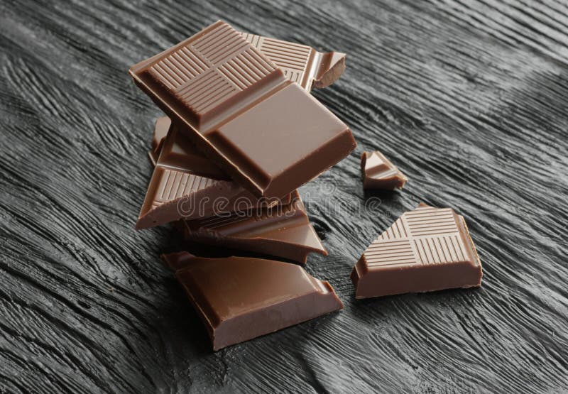 Broken Dark Chocolate on a Wooden Table Stock Photo - Image of gourmet ...
