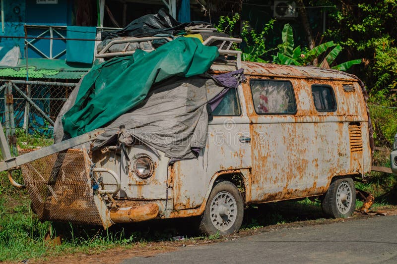 Broken and Decaying Van or Bus from the Seventies is Rotting on Green ...
