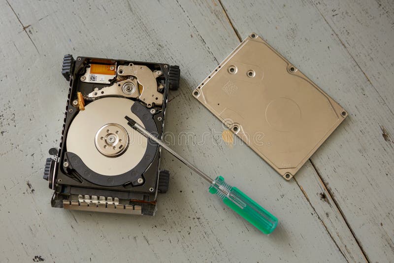 Broken and Destroyed Hard Drive Disk and Tools on Wooden Table Stock ...