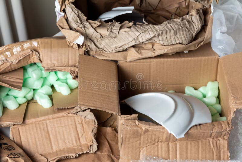 Broken Dish in a Damaged Cardboard Box Stock Photo - Image of crockery ...