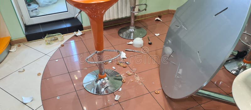Broken Dishes and Table on Floor in Kitchen Stock Photo - Image of ...