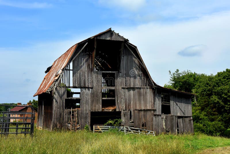 Broken Down Barn stock photo. Image of faded, rusting - 267756326