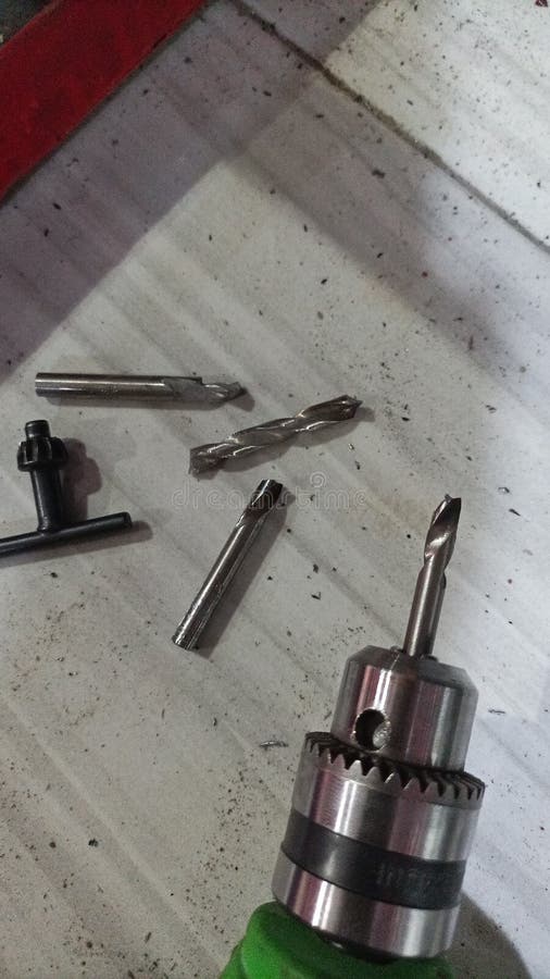 Broken Drill Bit and Key for Open Drill Stock Image - Image of open ...