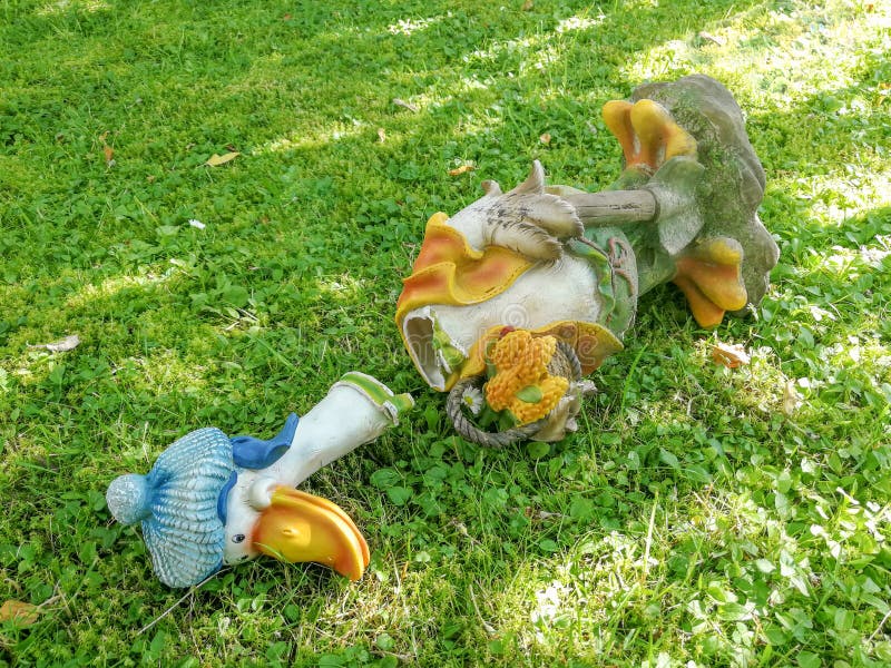 Broken Duck Statue on the Green Grass Stock Image - Image of sculpture ...