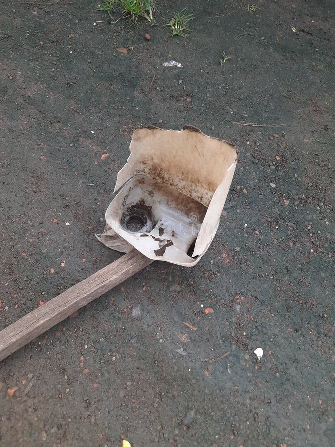 A Broken Dustpan Lay on the Ground Stock Photo - Image of number, floor ...