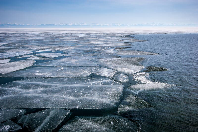 The Broken Edge of Ice and Open Water on Lake Baikal. Stock Image ...