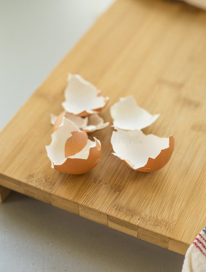 Broken Egg Shell on Wooden Cutting Board Stock Image - Image of diet ...