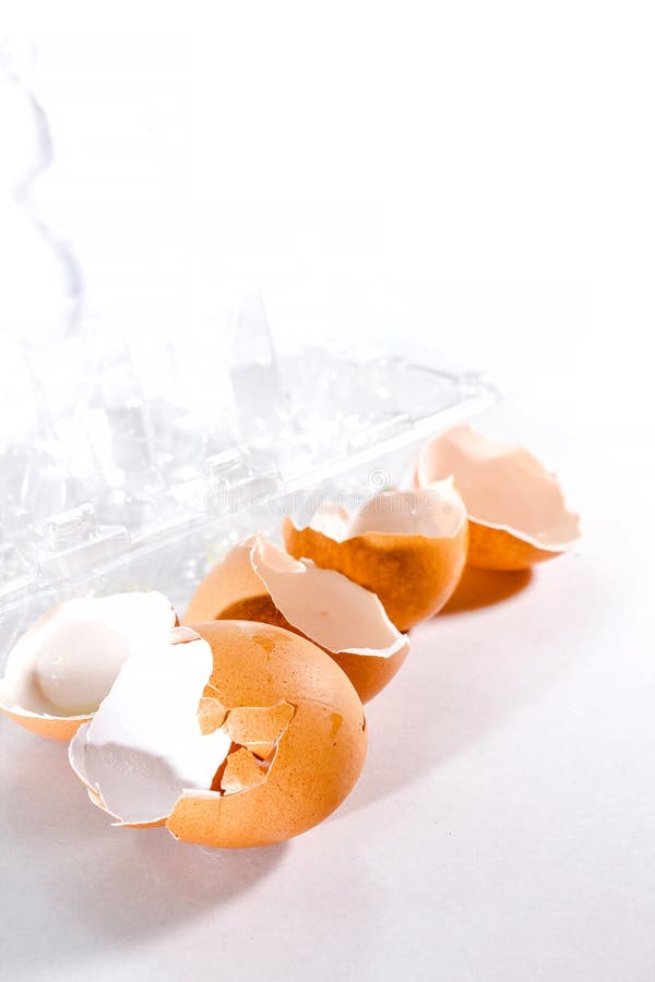 Broken Egg on White Background, Stock Photo - Image of brown, concept ...