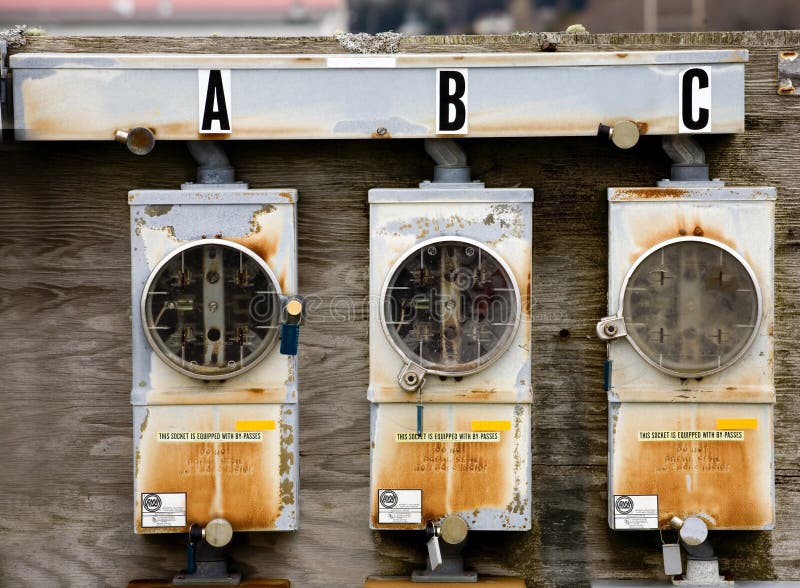 Row of Electric Meters stock photo. Image of concrete - 4272352