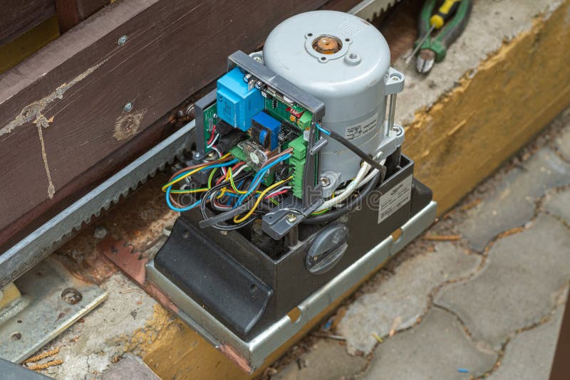 Broken Electric Motor Engine of Gate with Gate Rack Rail. Imagen de ...