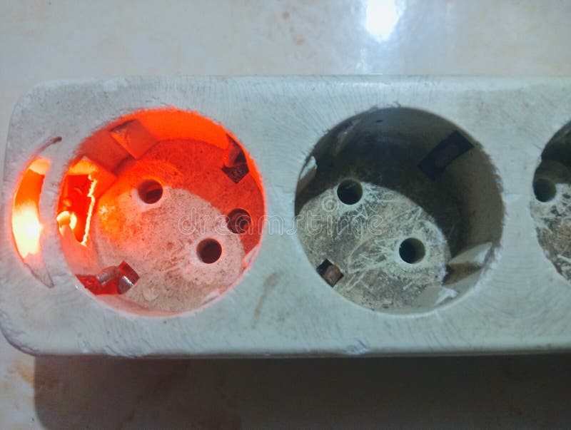 Broken Electrical Outlet in Beige Wall. White Electrical Outlet with ...