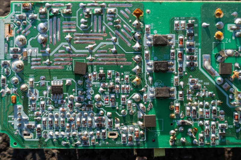 Broken Electronics Board on Ground Outdoors in Sunlight Stock Image ...