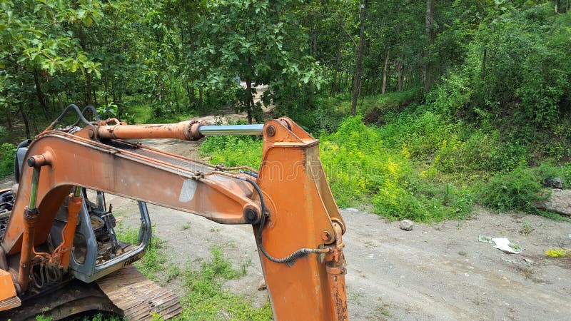 Old Broken Excavator is Being Repaired. Rusty Metal, Remnants of Old ...