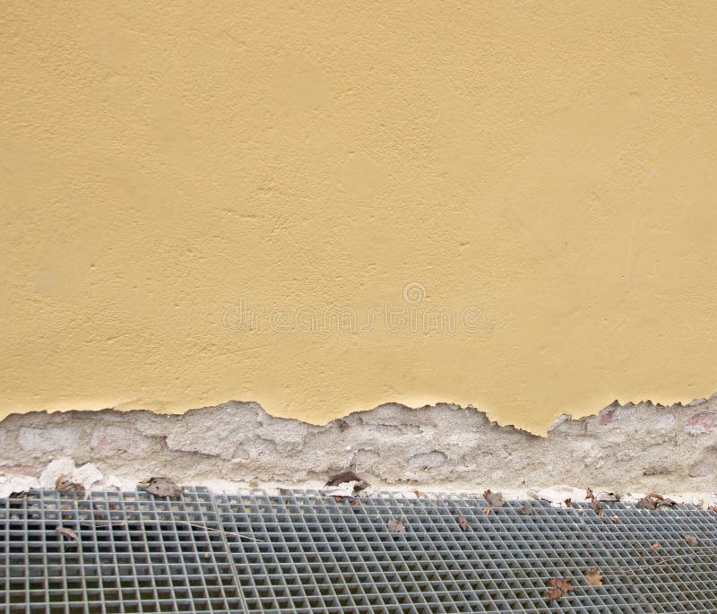 Broken Facade, Crumbling Plaster on a Yellow Wall Stock Photo - Image ...