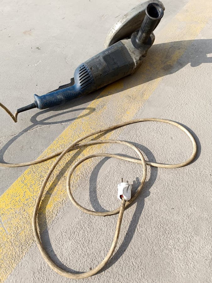 Broken and Faulty Electrical Plug and Cable Connected To the Grinder ...