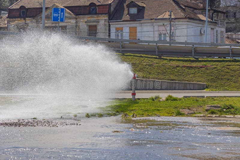 Broken Fire Hydrant Floods stock image. Image of spray - 248661059