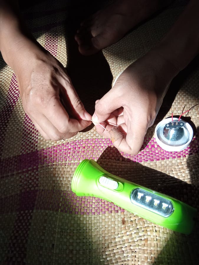 The Process of Repairing a Broken Flashlight Stock Image - Image of ...