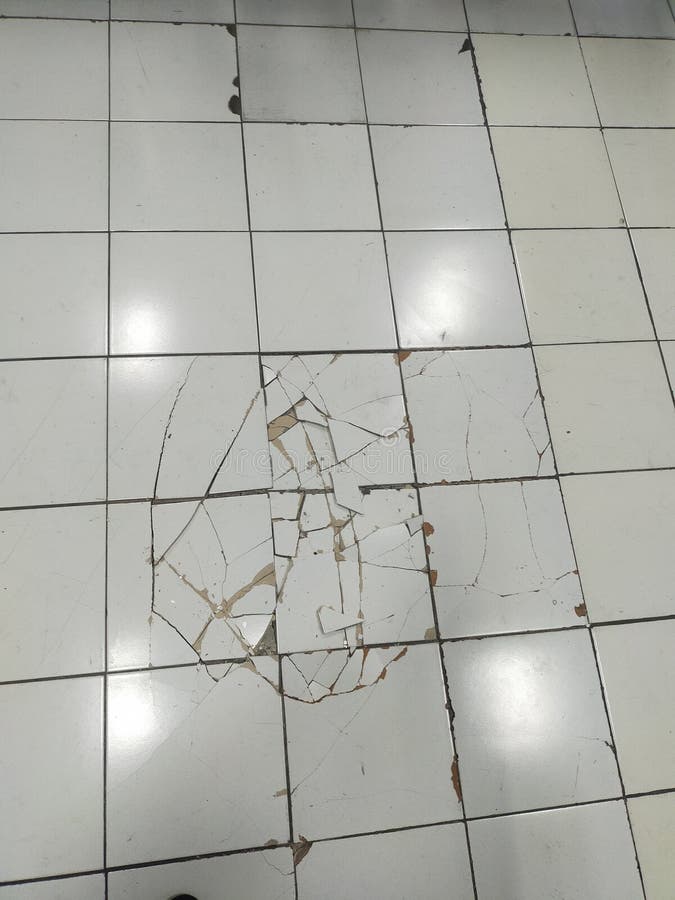 Broken Floor Tiles, Closeup of Cracked Ceramic Tiles, Brown Tile Cracks ...