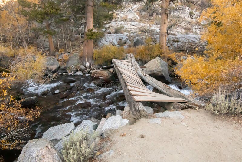 Broken Foot Bridge Over Rushing Stream and Rocks Stock Image - Image of ...