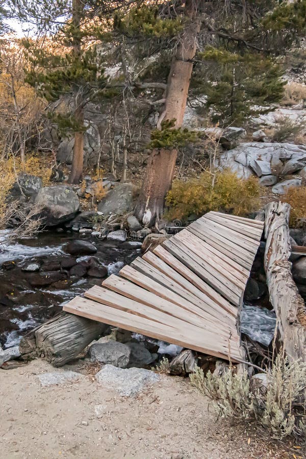 Broken Foot Bridge Over Rushing Stream and Rocks Stock Photo - Image of ...