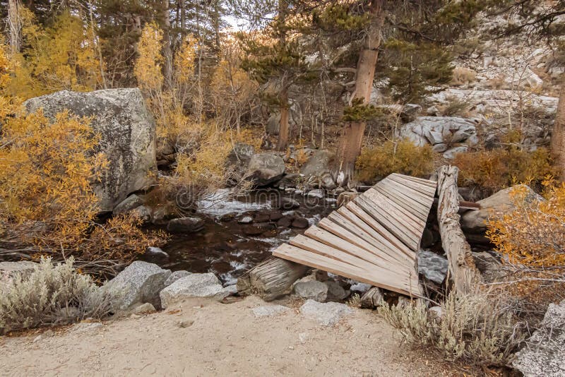 Broken Foot Bridge Over Rushing Stream and Rocks Stock Photo - Image of ...