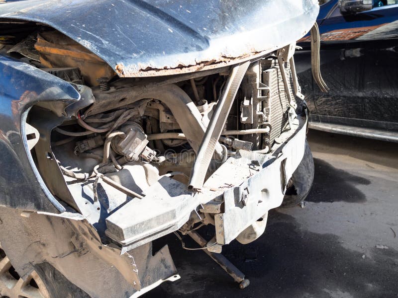 Broken Front Wheel and Wing of a Passenger Car in a Parking Lot Stock ...