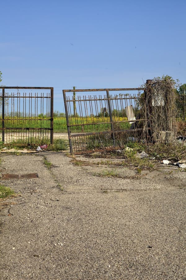Broken Gate at the End of a Road on a Sunny Day in the Italian ...