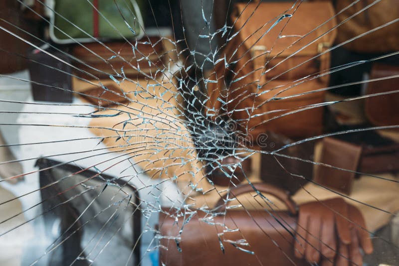 Shop Window Display with Broken Glass Stock Photo - Image of criminal ...